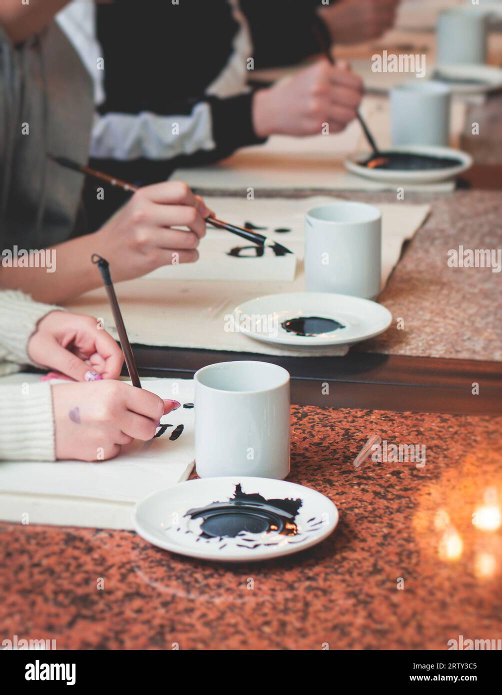 Chinese calligraphy lesson, group of kids learn and practicing ...