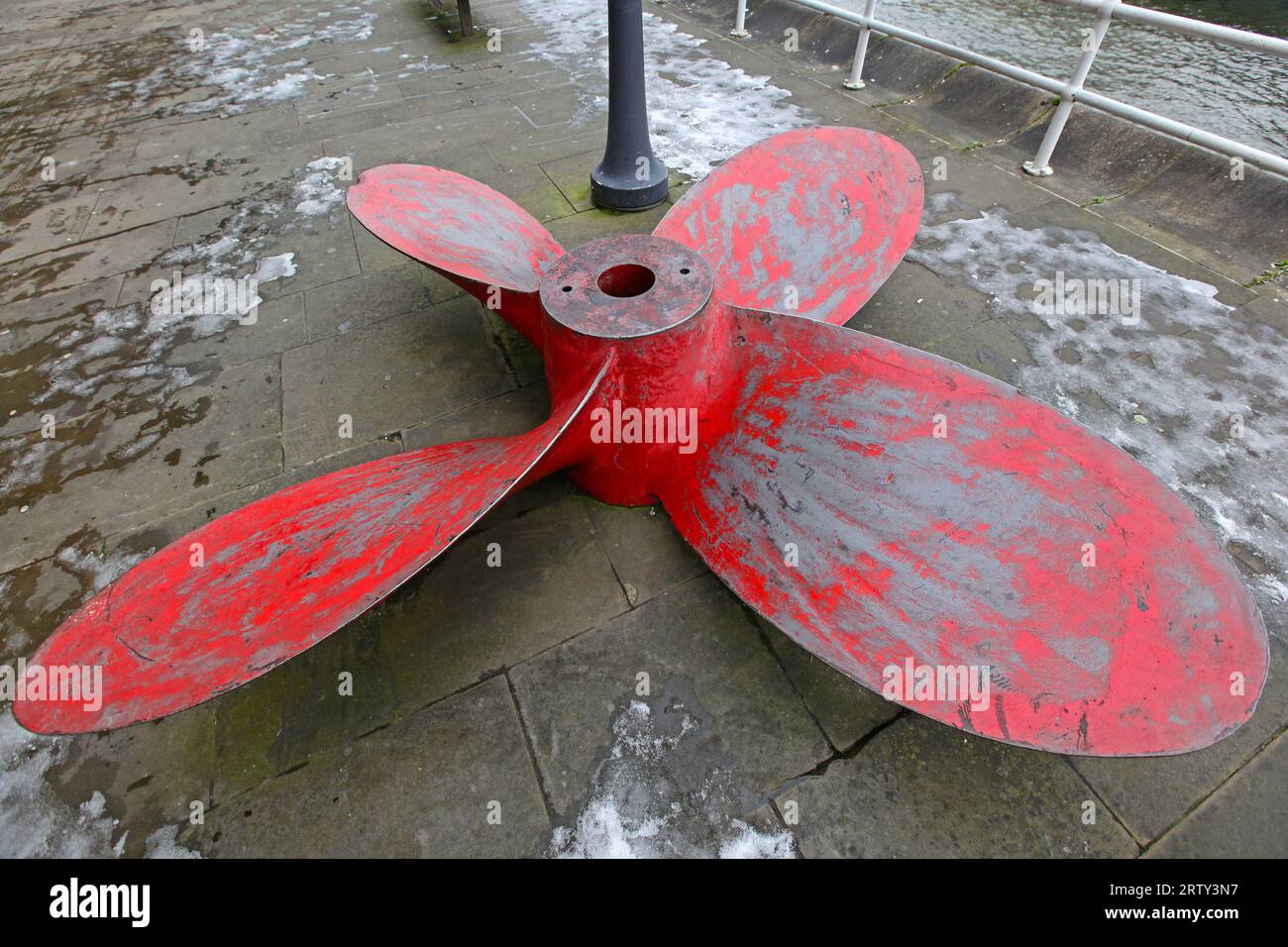 Large Red Propeller With Four Blades at Street Pavement Winter Day ...