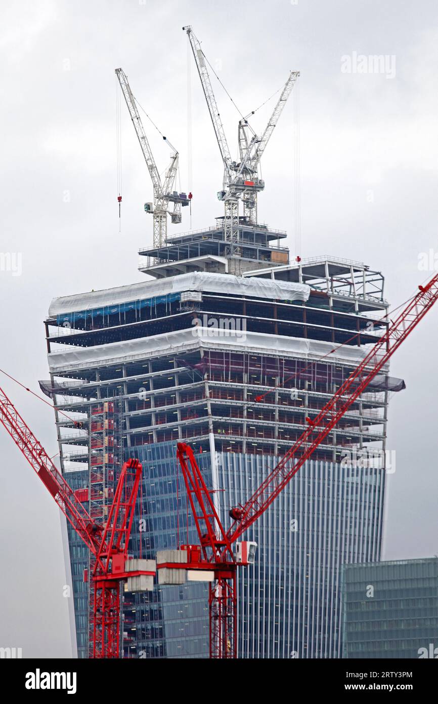Many Cranes at Top of Skyscraper Construction Site in London City ...
