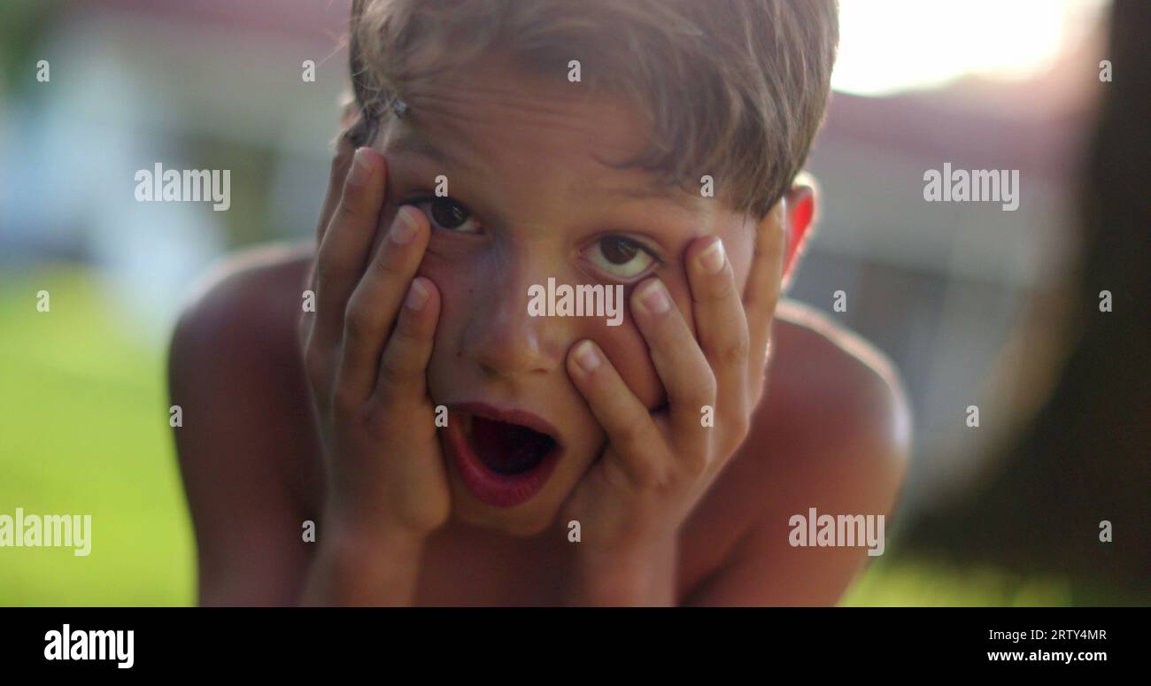Child reaction with shock and despair portrait. Kid reacting with ...