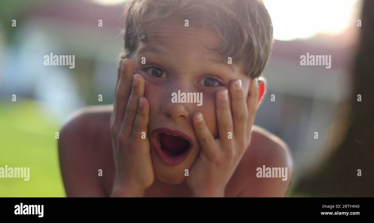 Child reaction with shock and despair portrait. Kid reacting with ...