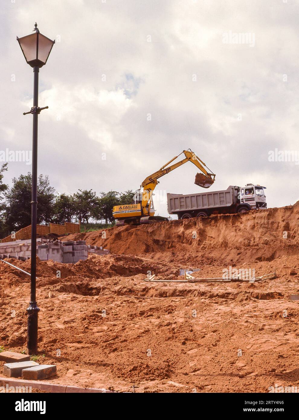Truck being loaded on a construction site Stock Photo - Alamy