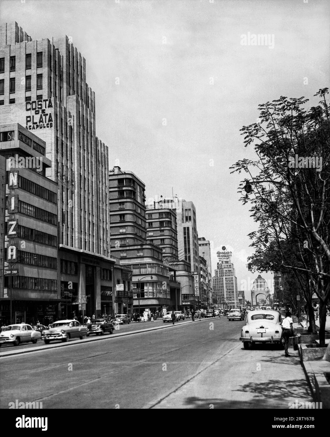 Mexico City, Mexico c. 1957 Avenida Juarez in Mexico City. The domed ...