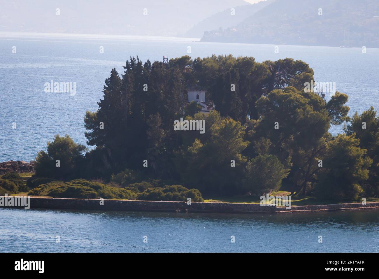 View of Pontikonisi islet, Mouse Island with Byzantine chapel of ...