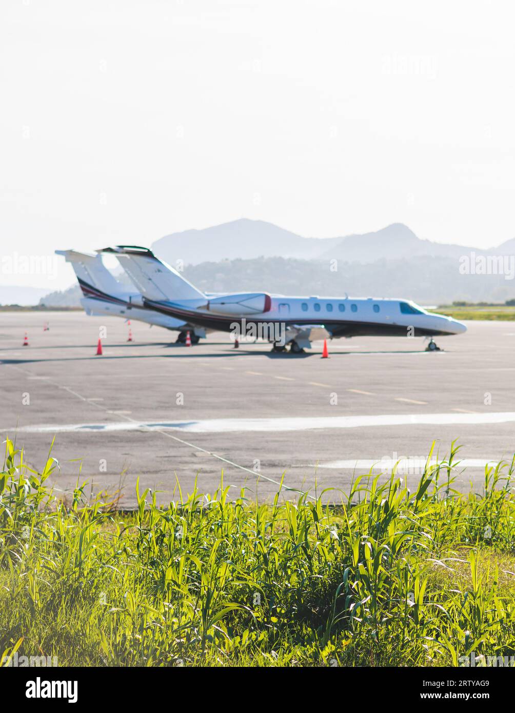 View of modern private reactive aircraft on an runway airfield ready to ...