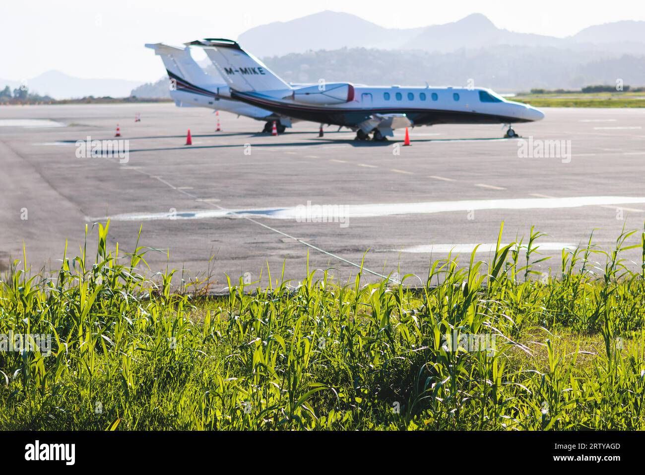 View of modern private reactive aircraft on an runway airfield ready to ...