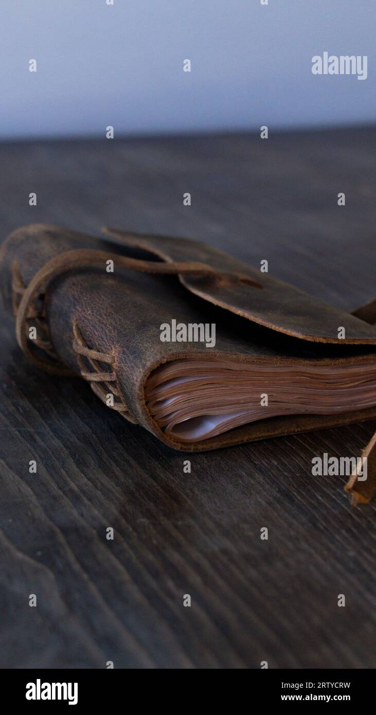 Old book on writing desk hi-res stock photography and images - Alamy