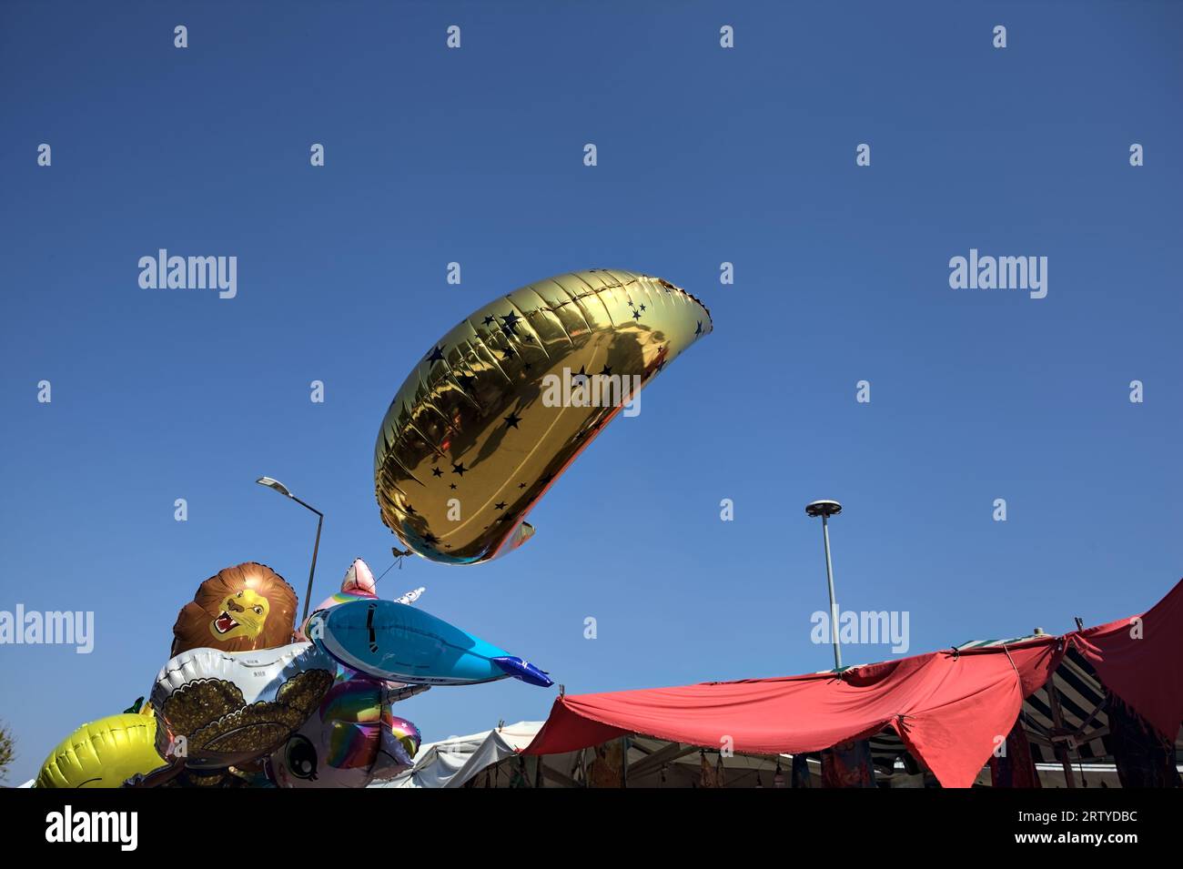 Floating baloons with a clear blue sky as background Stock Photo - Alamy