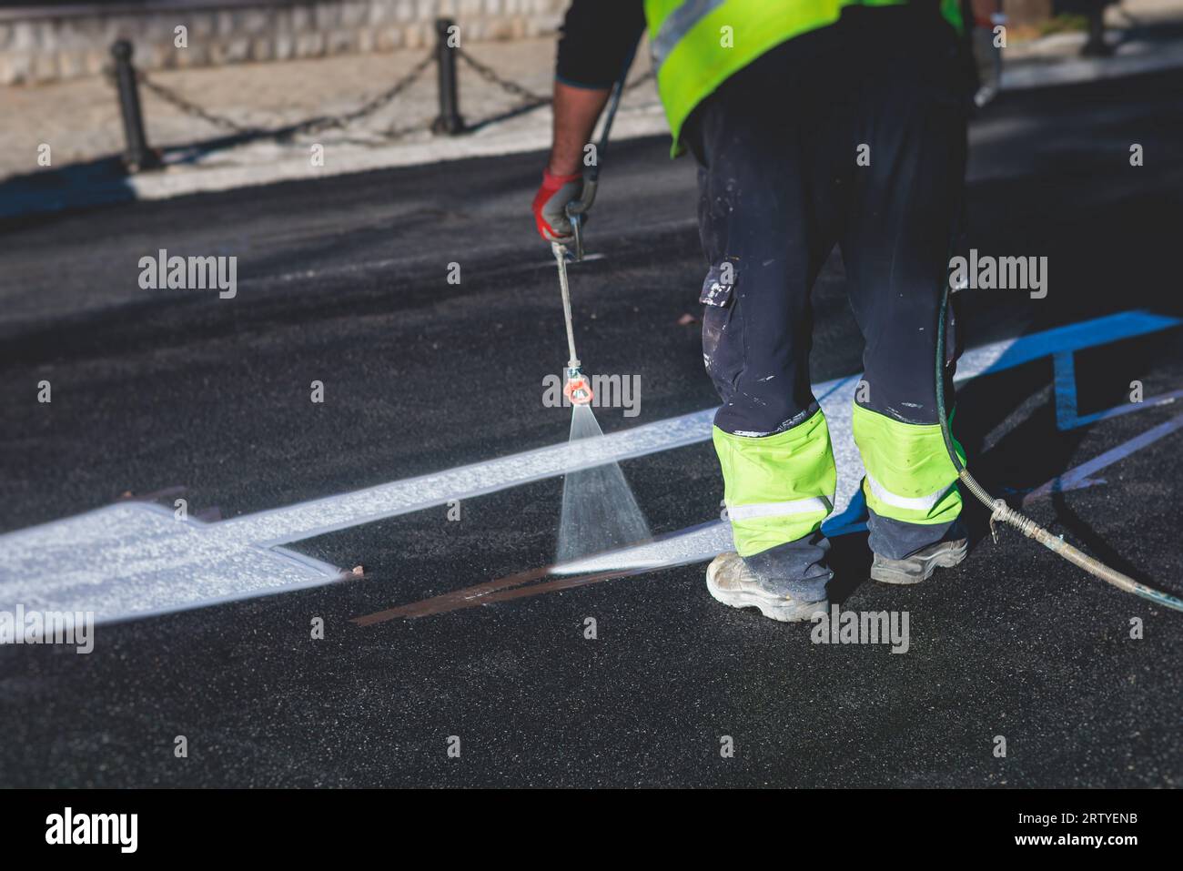 Process of making new road surface markings with a line striping ...