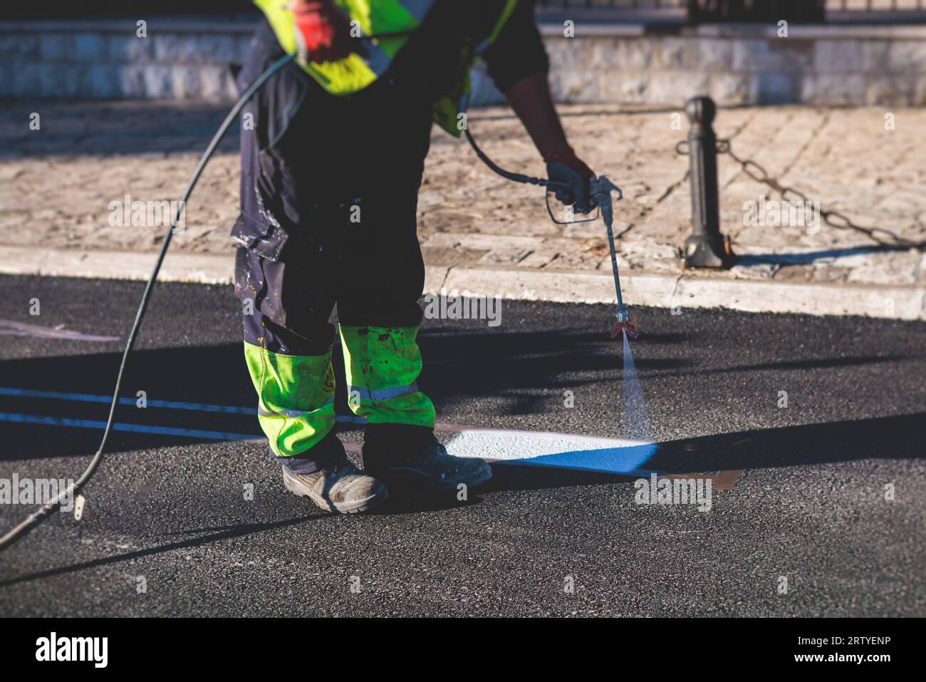 Process of making new road surface markings with a line striping ...