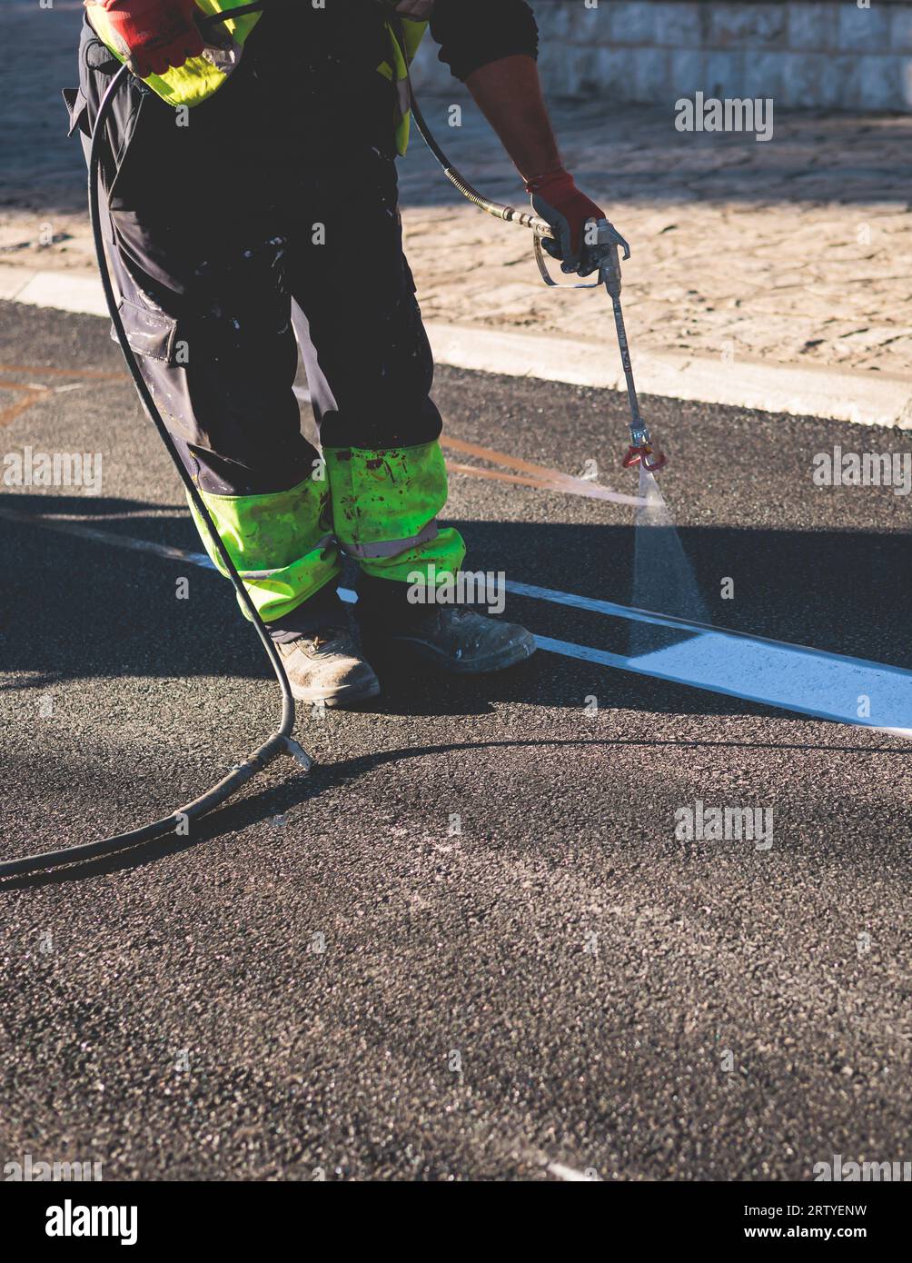 Process of making new road surface markings with a line striping ...