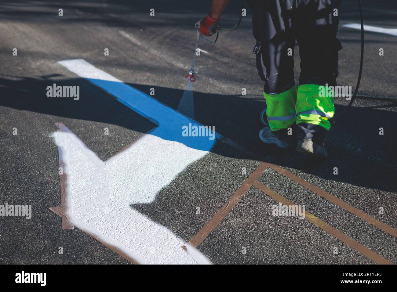 Process of making new road surface markings with a line striping ...