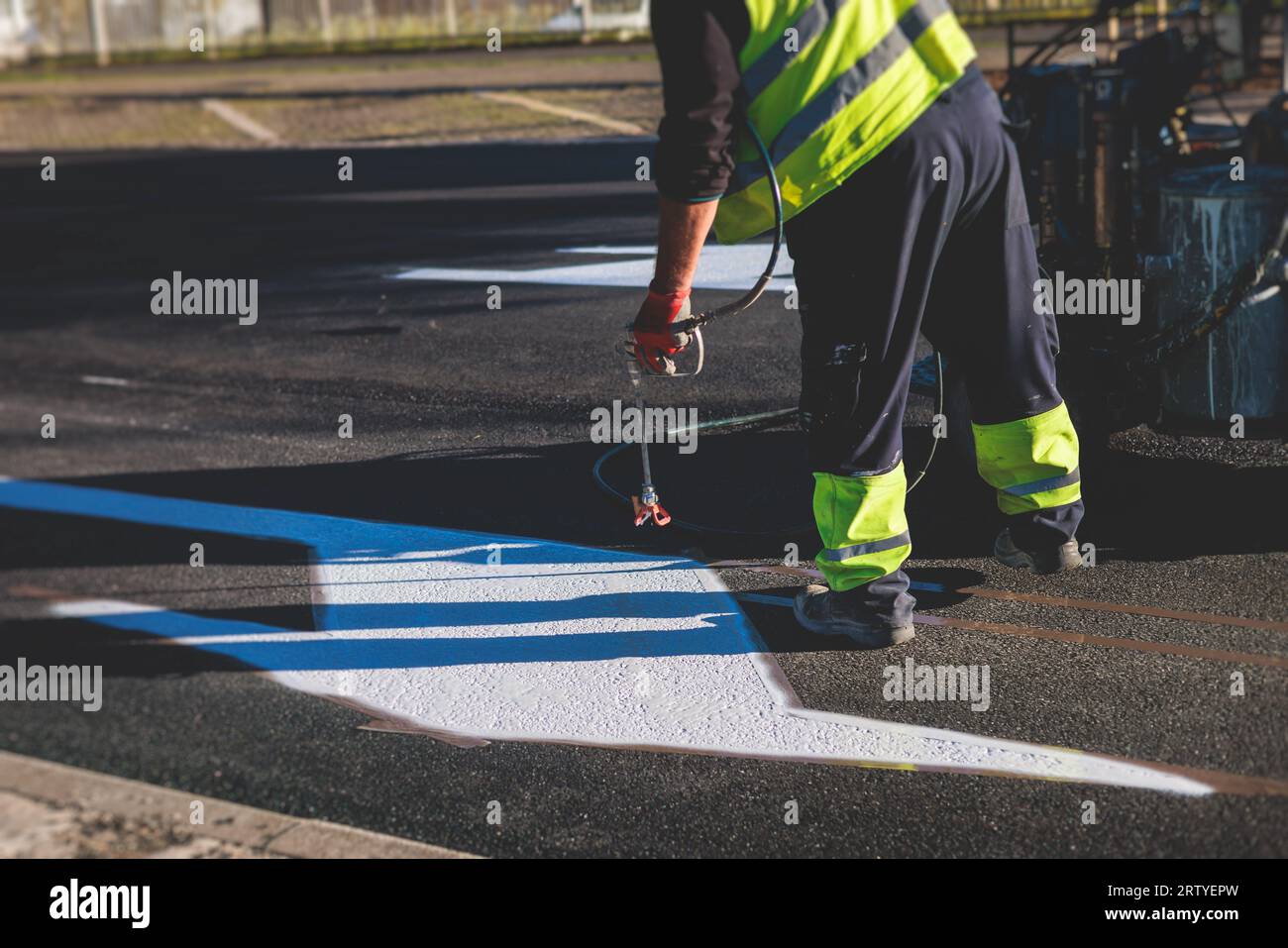 Process of making new road surface markings with a line striping ...