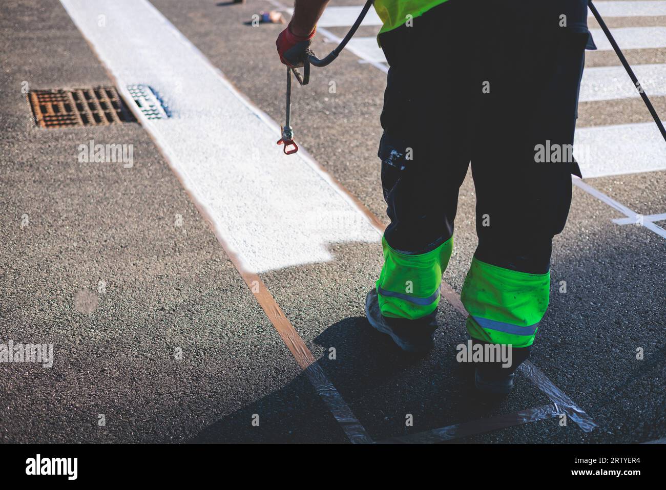 Process of making new road surface markings with a line striping ...