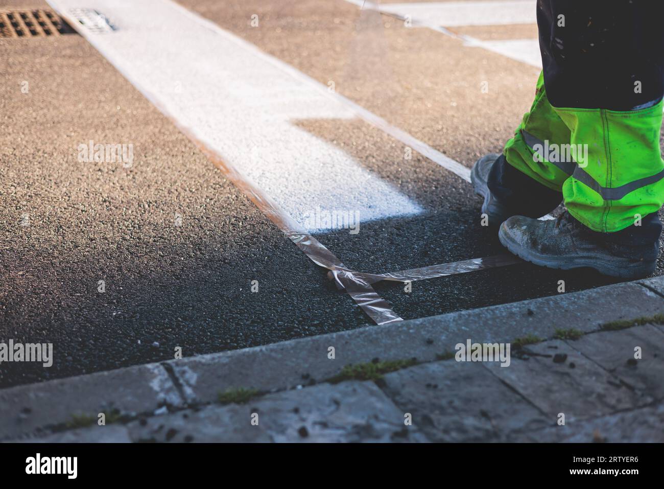 Process of making new road surface markings with a line striping ...