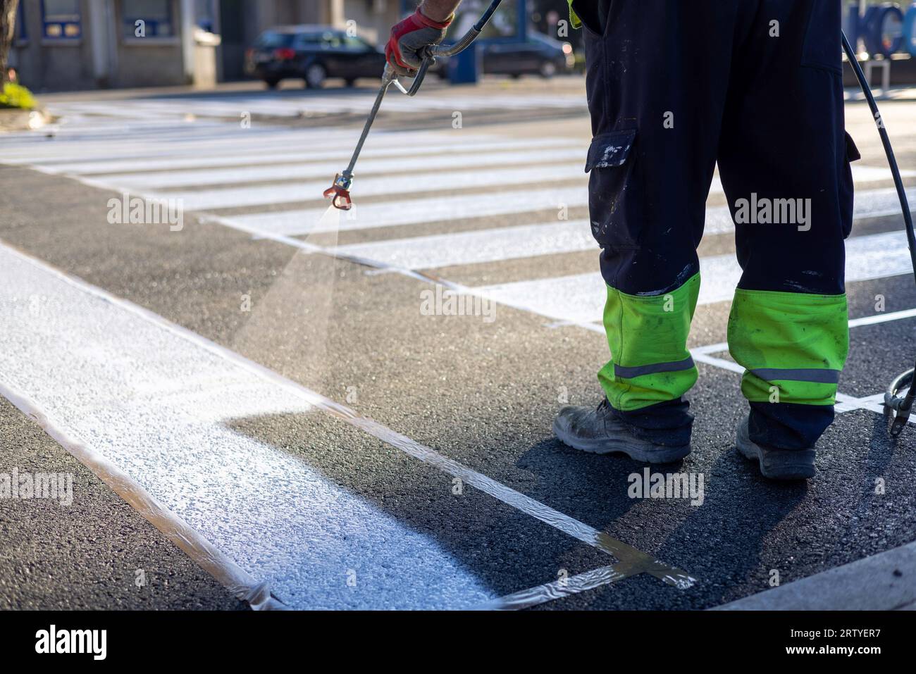 Process of making new road surface markings with a line striping ...