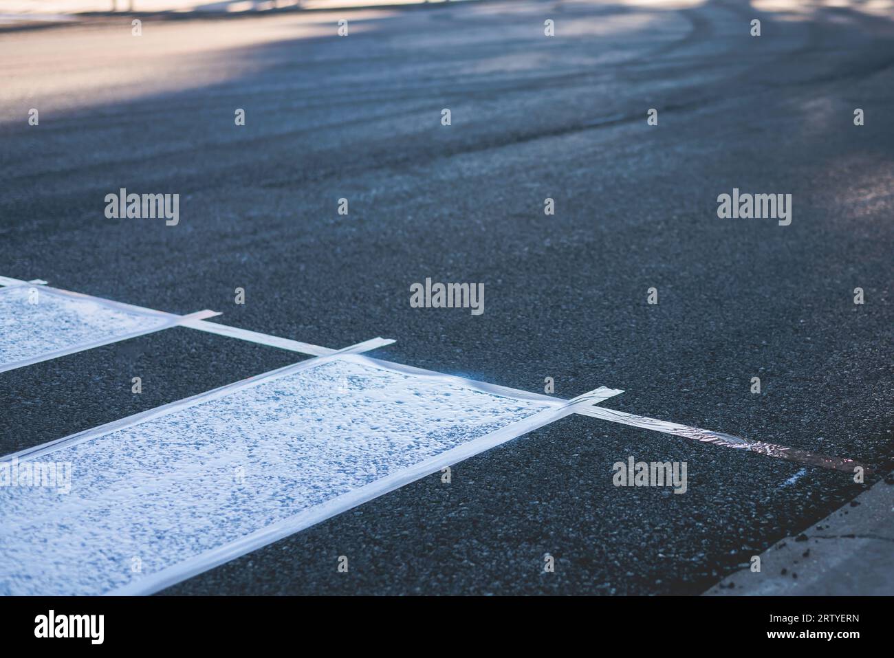 Process of making new road surface markings with a line striping ...