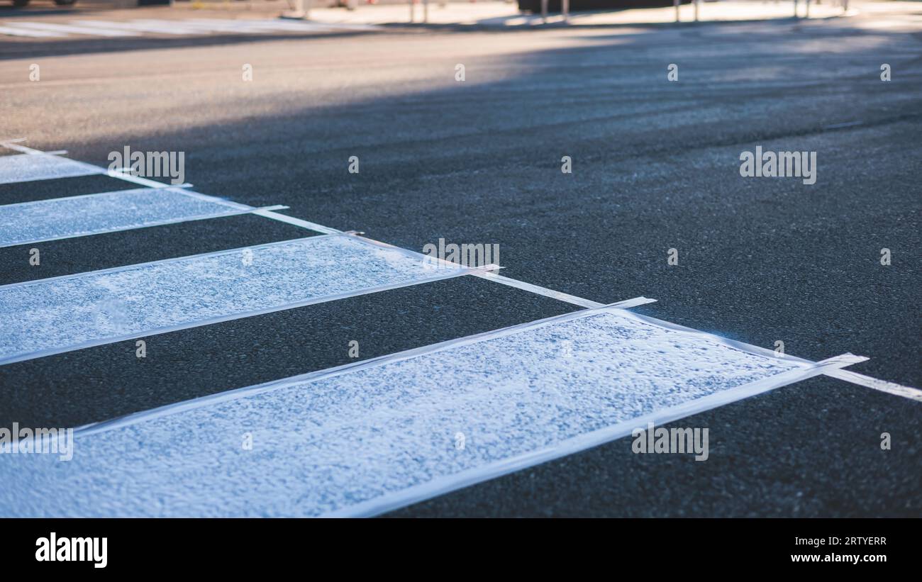 Process of making new road surface markings with a line striping ...