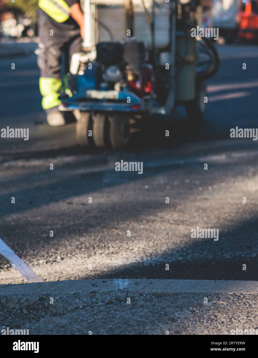 Process of making new road surface markings with a line striping ...