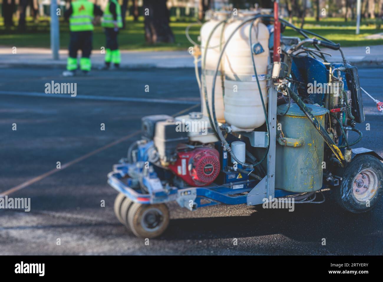 Process of making new road surface markings with a line striping ...