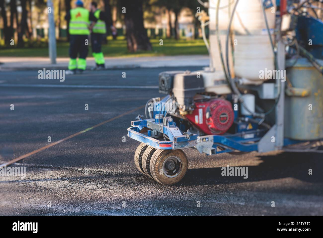 Process of making new road surface markings with a line striping ...