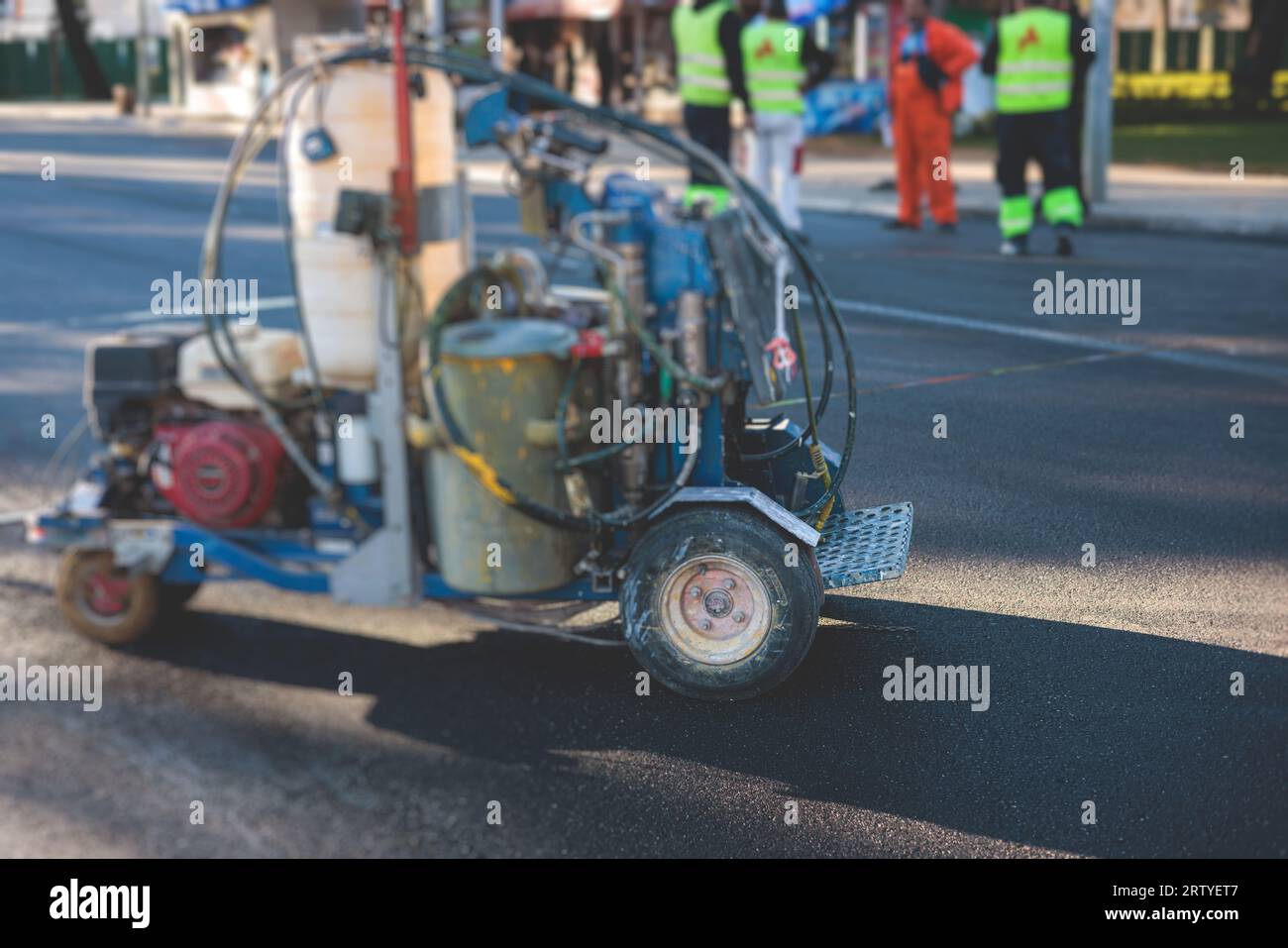 Process of making new road surface markings with a line striping ...