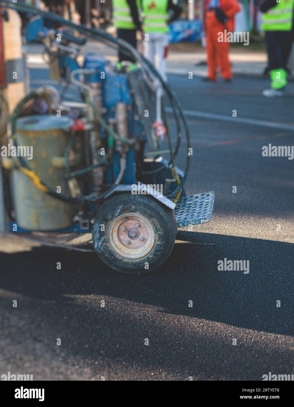 Process of making new road surface markings with a line striping ...