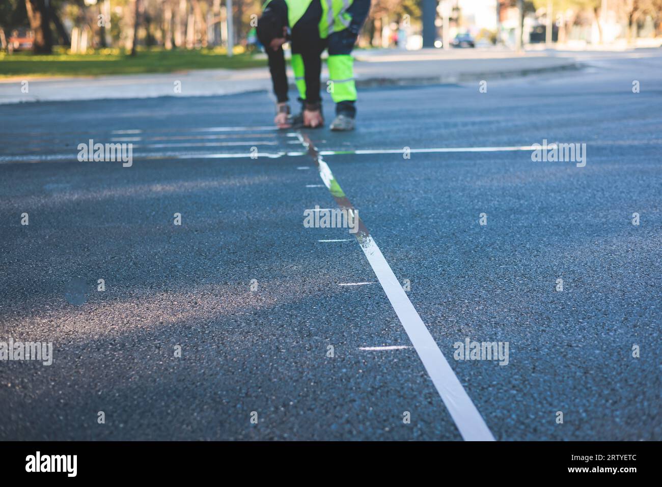 Process of making new road surface markings with a line striping ...