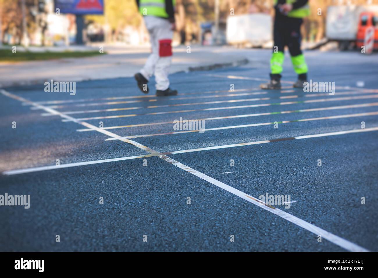 Process of making new road surface markings with a line striping ...