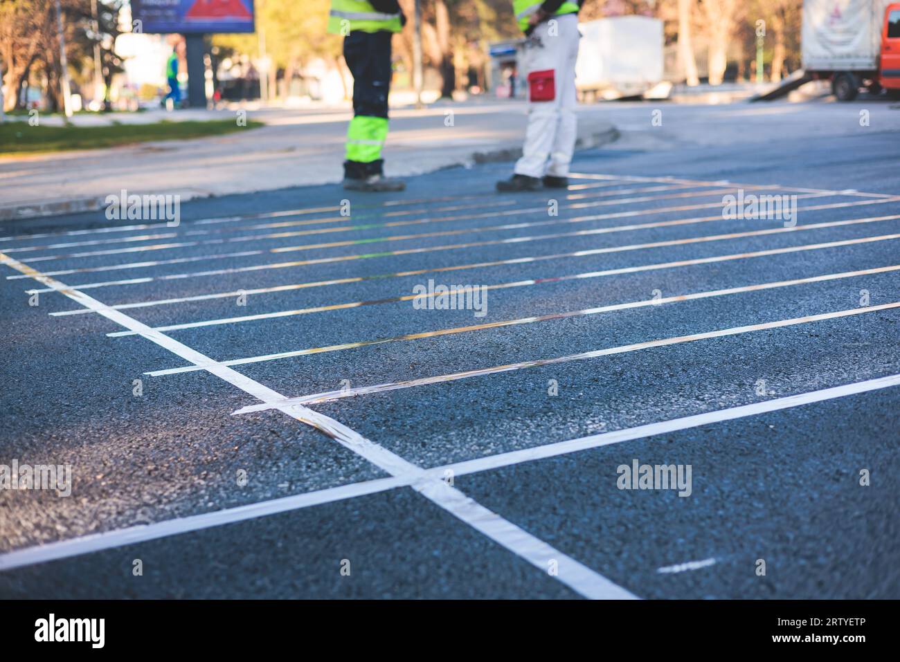 Process of making new road surface markings with a line striping ...
