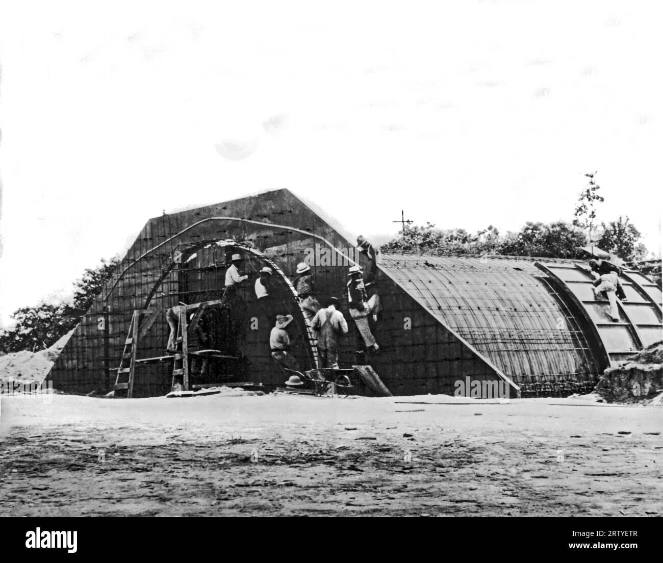 Biloxi, Mississippi: 1938. Soldiers building an igloo magazine for ...
