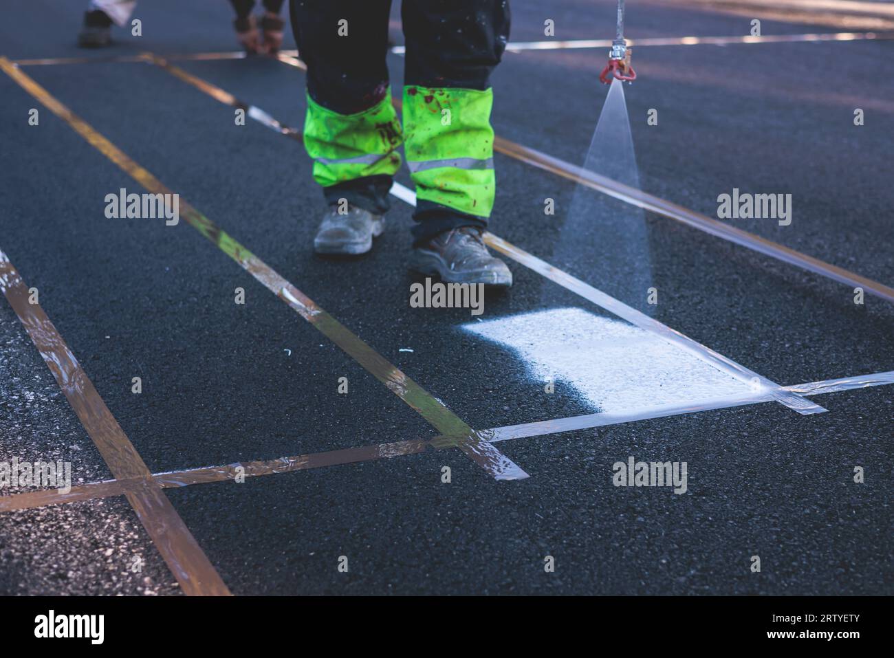 Process of making new road surface markings with a line striping ...
