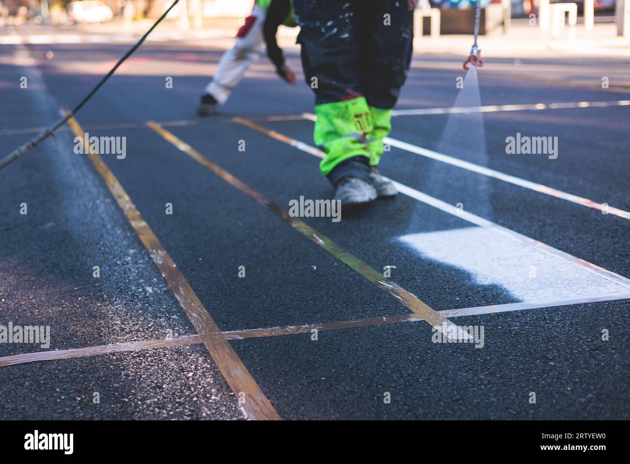 Process of making new road surface markings with a line striping ...