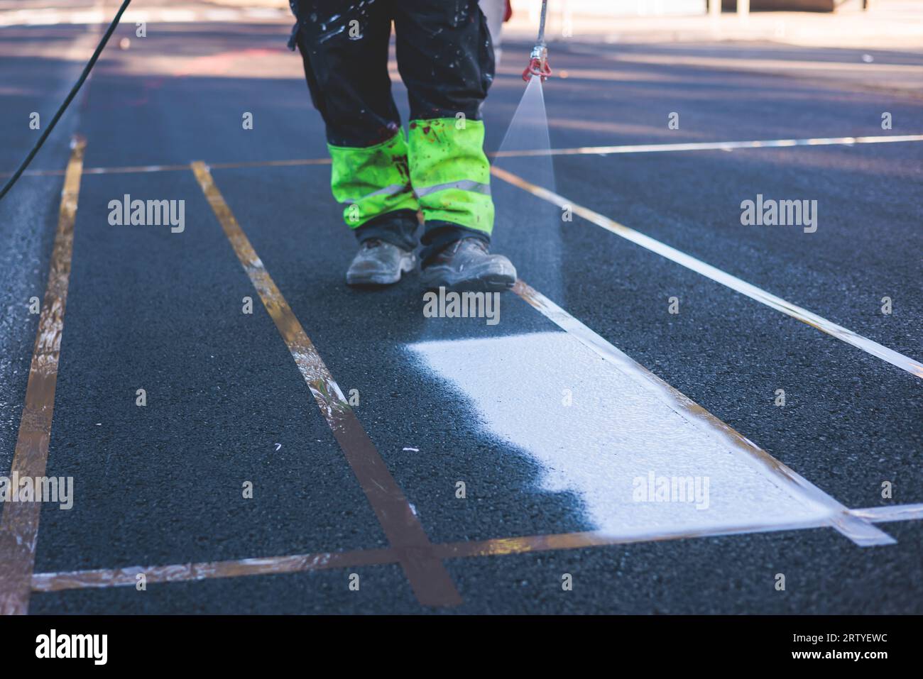 Process of making new road surface markings with a line striping ...