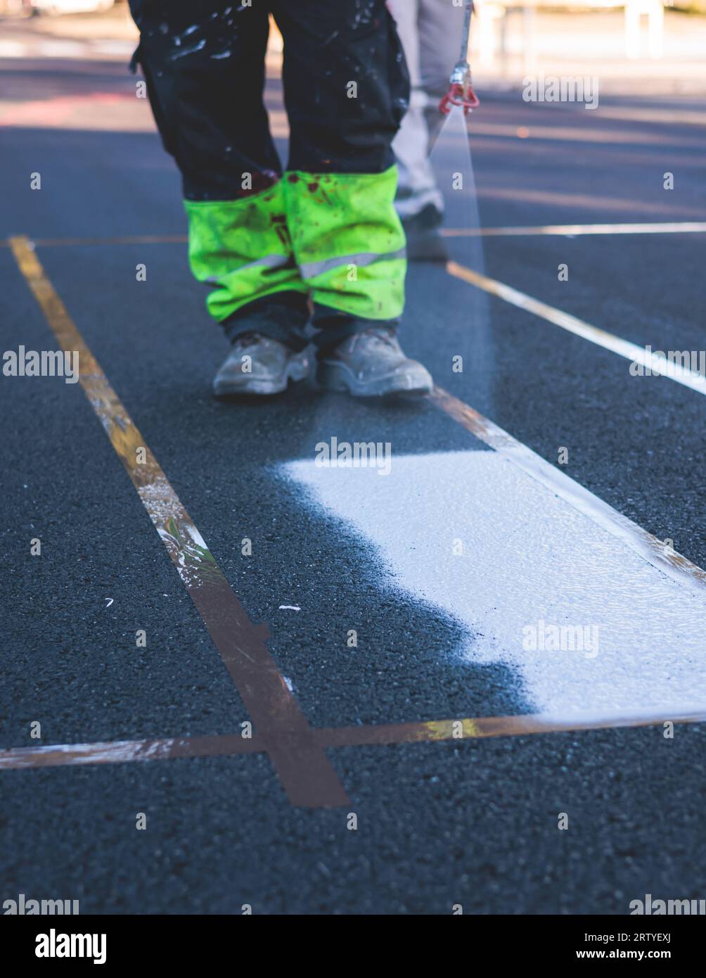 Process of making new road surface markings with a line striping ...