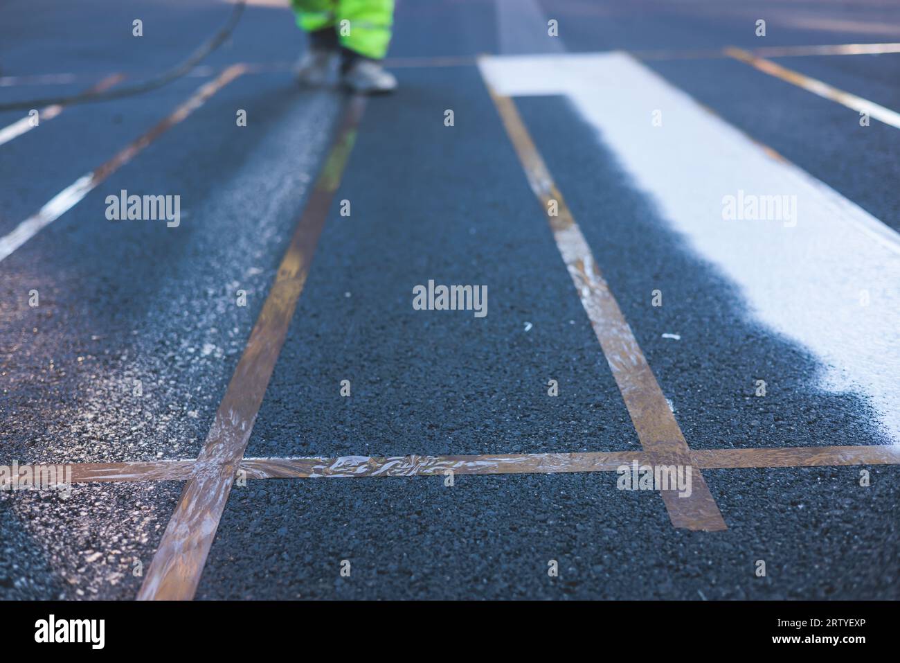 Process of making new road surface markings with a line striping ...