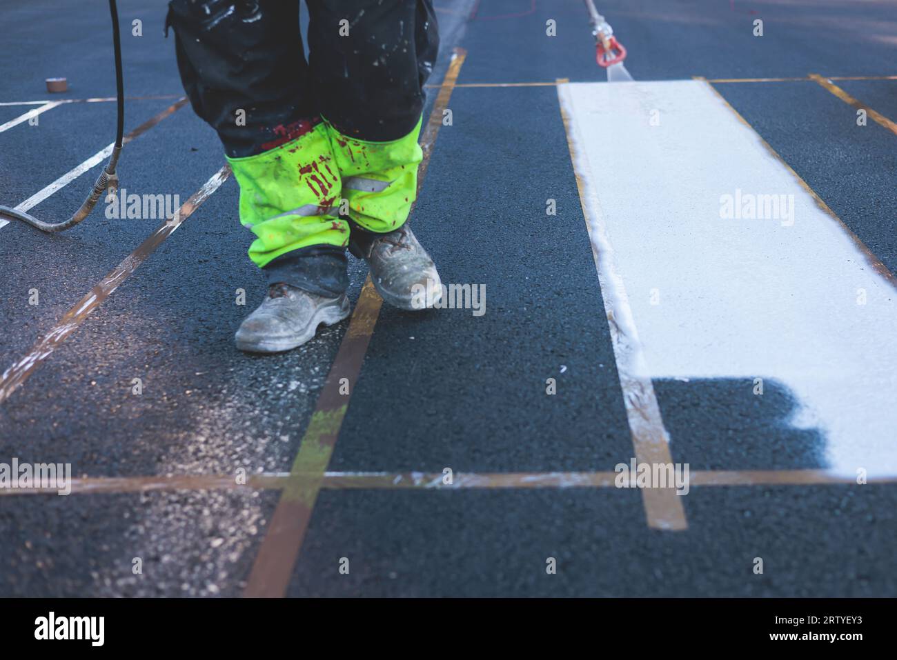 Process of making new road surface markings with a line striping ...