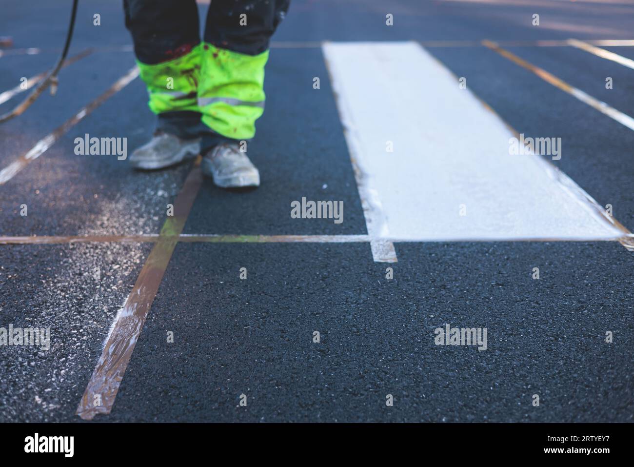 Process of making new road surface markings with a line striping ...