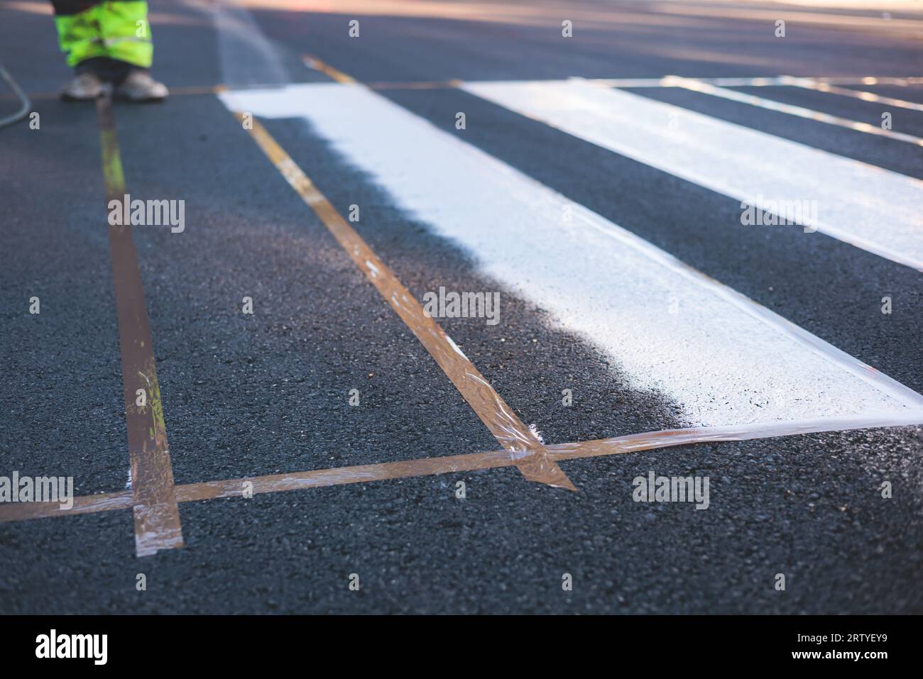 Process of making new road surface markings with a line striping ...