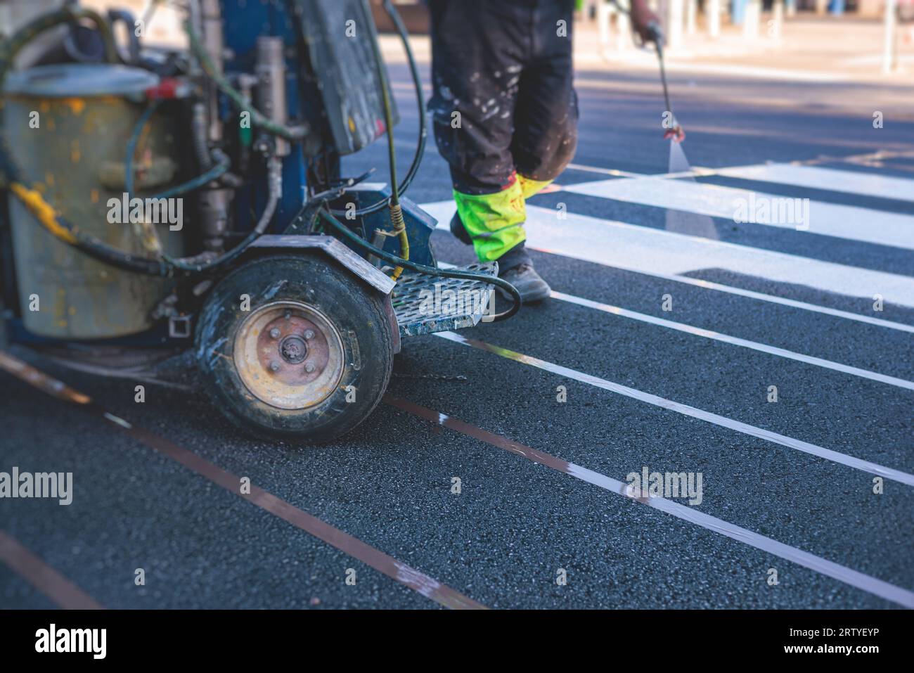 Process of making new road surface markings with a line striping ...