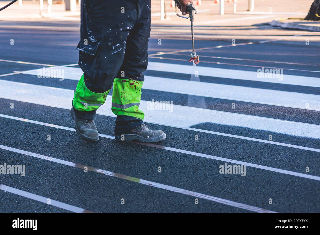 Process of making new road surface markings with a line striping ...