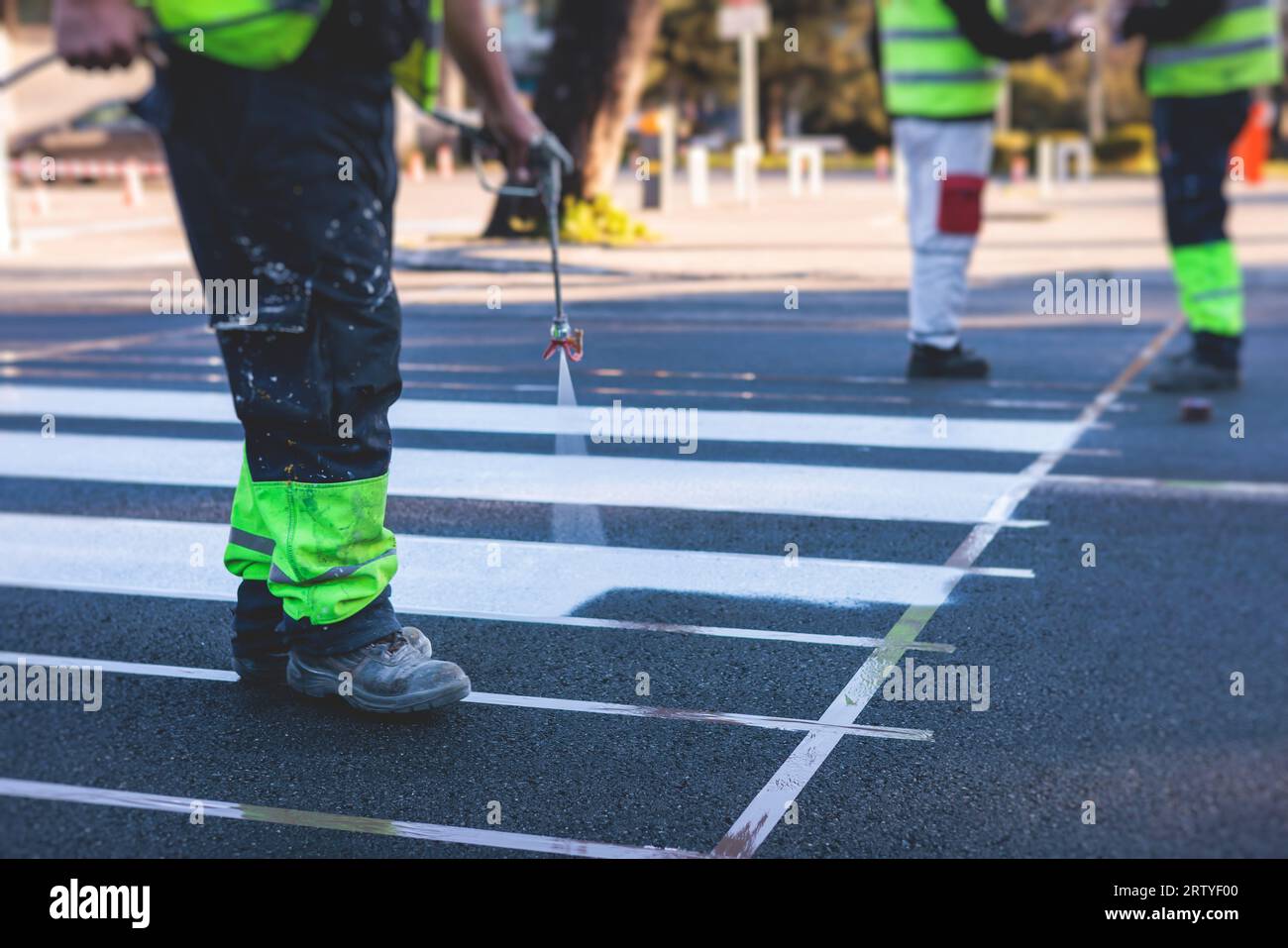 Process of making new road surface markings with a line striping ...