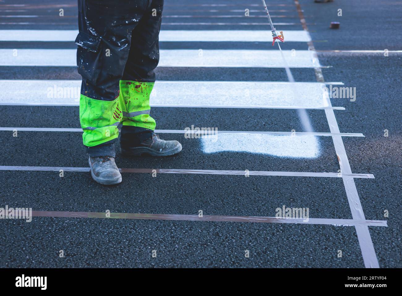 Process of making new road surface markings with a line striping ...