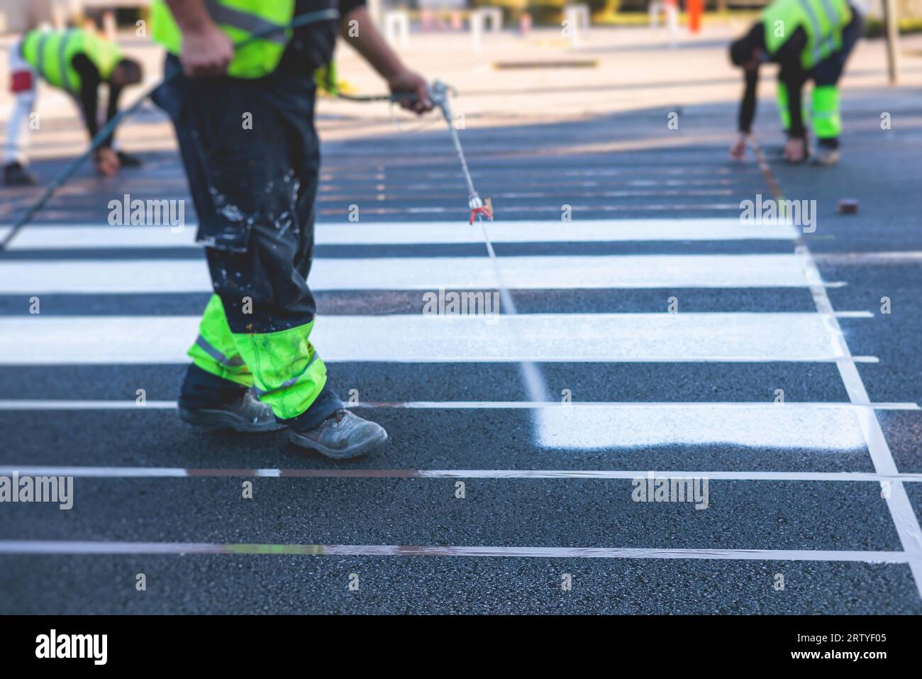 Process of making new road surface markings with a line striping ...