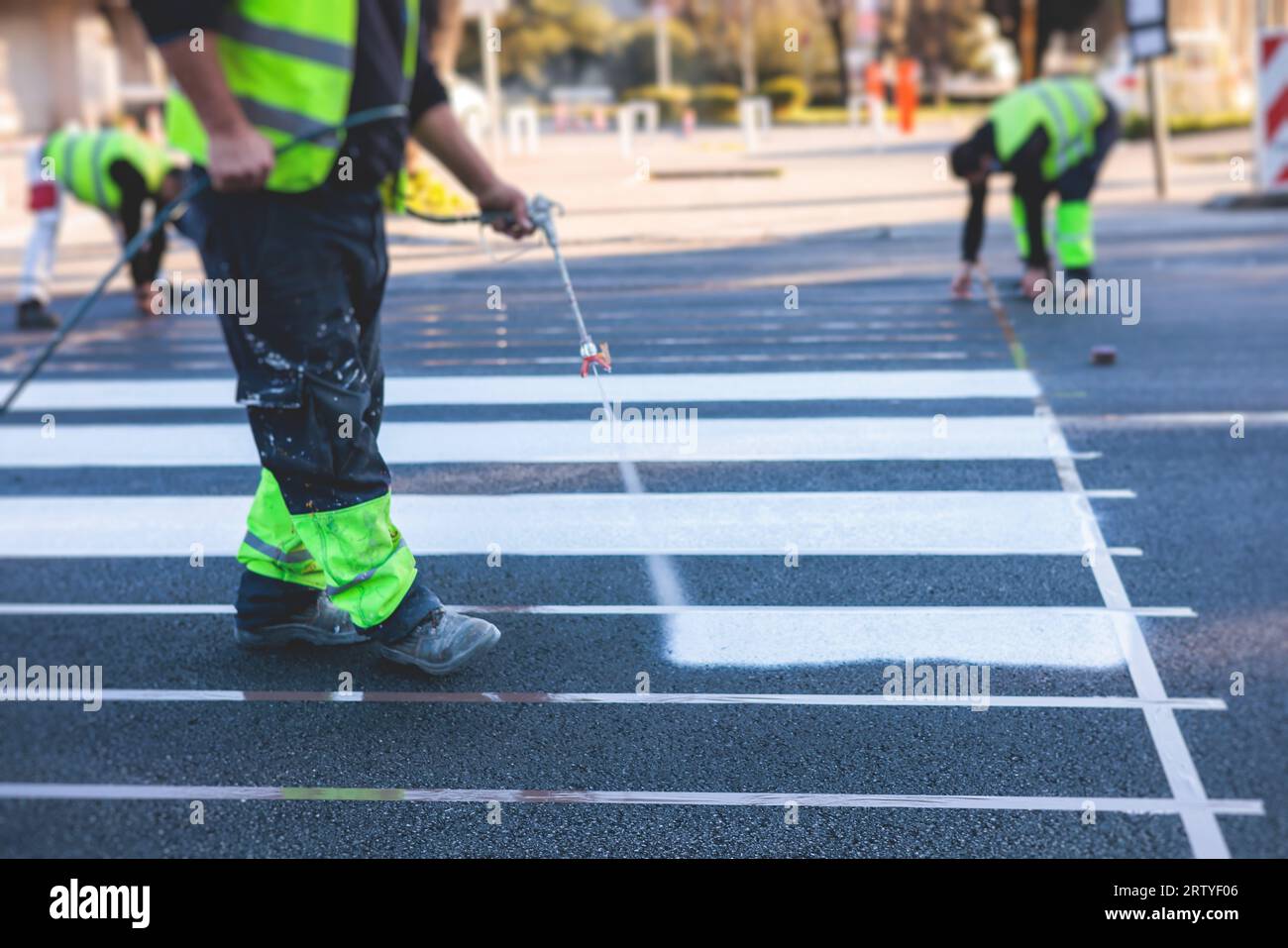 Process of making new road surface markings with a line striping ...