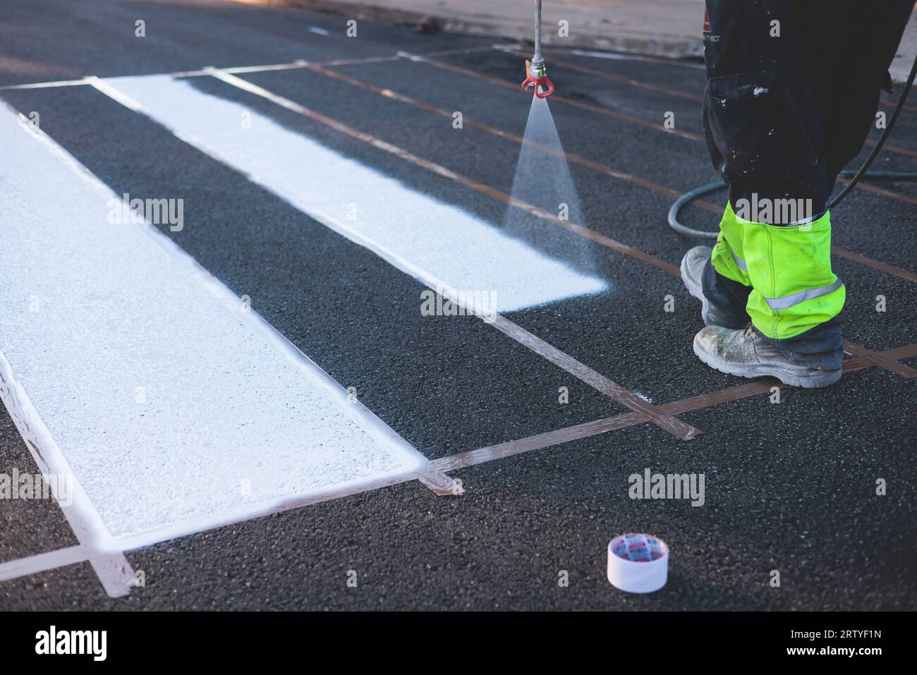 Process of making new road surface markings with a line striping ...