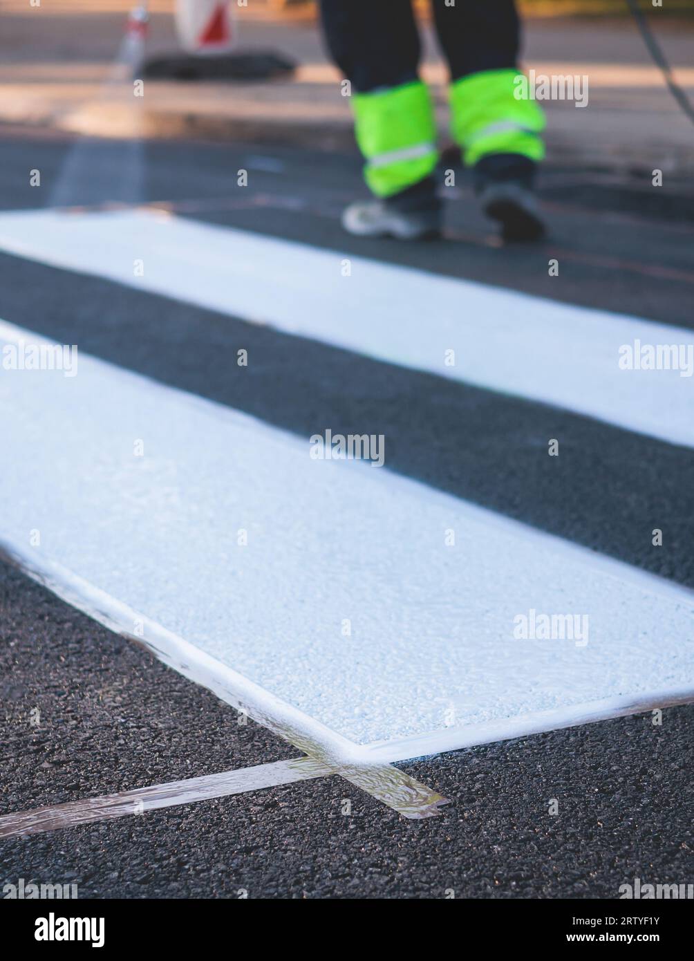 Process of making new road surface markings with a line striping ...