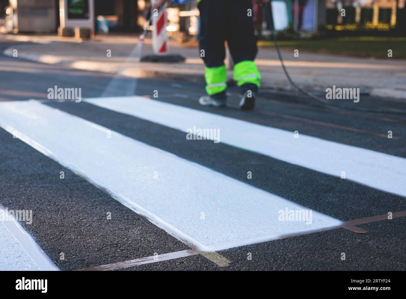 Process of making new road surface markings with a line striping ...