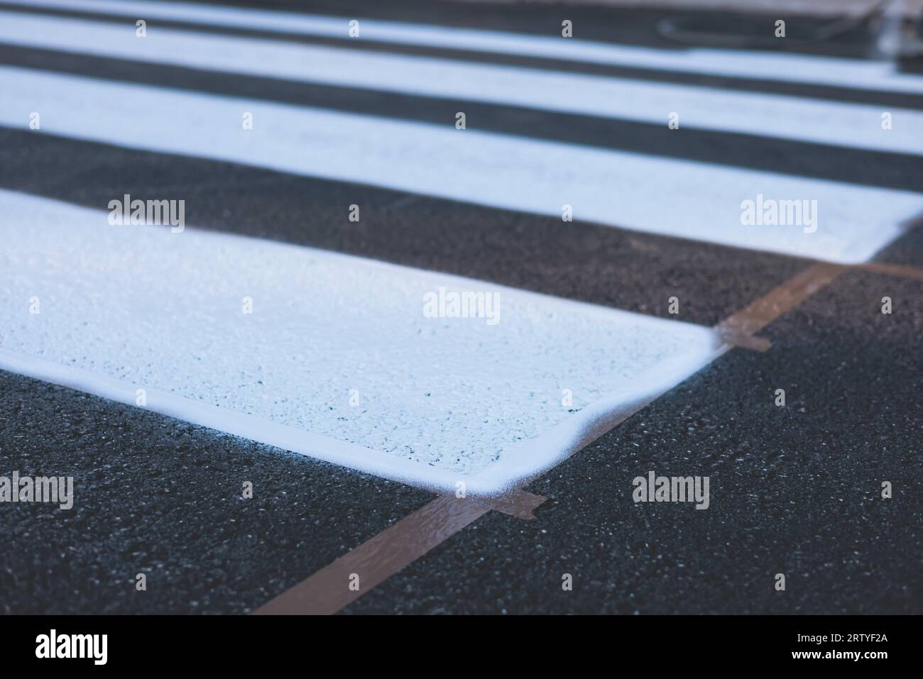 Process of making new road surface markings with a line striping ...