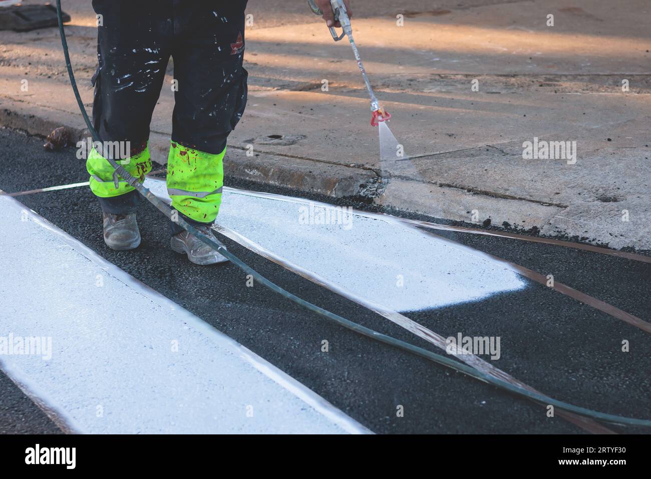 Process of making new road surface markings with a line striping ...